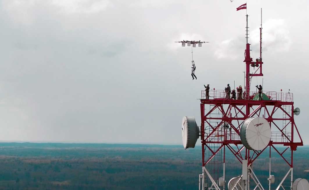 World’s first human jump from a drone : : FLYER