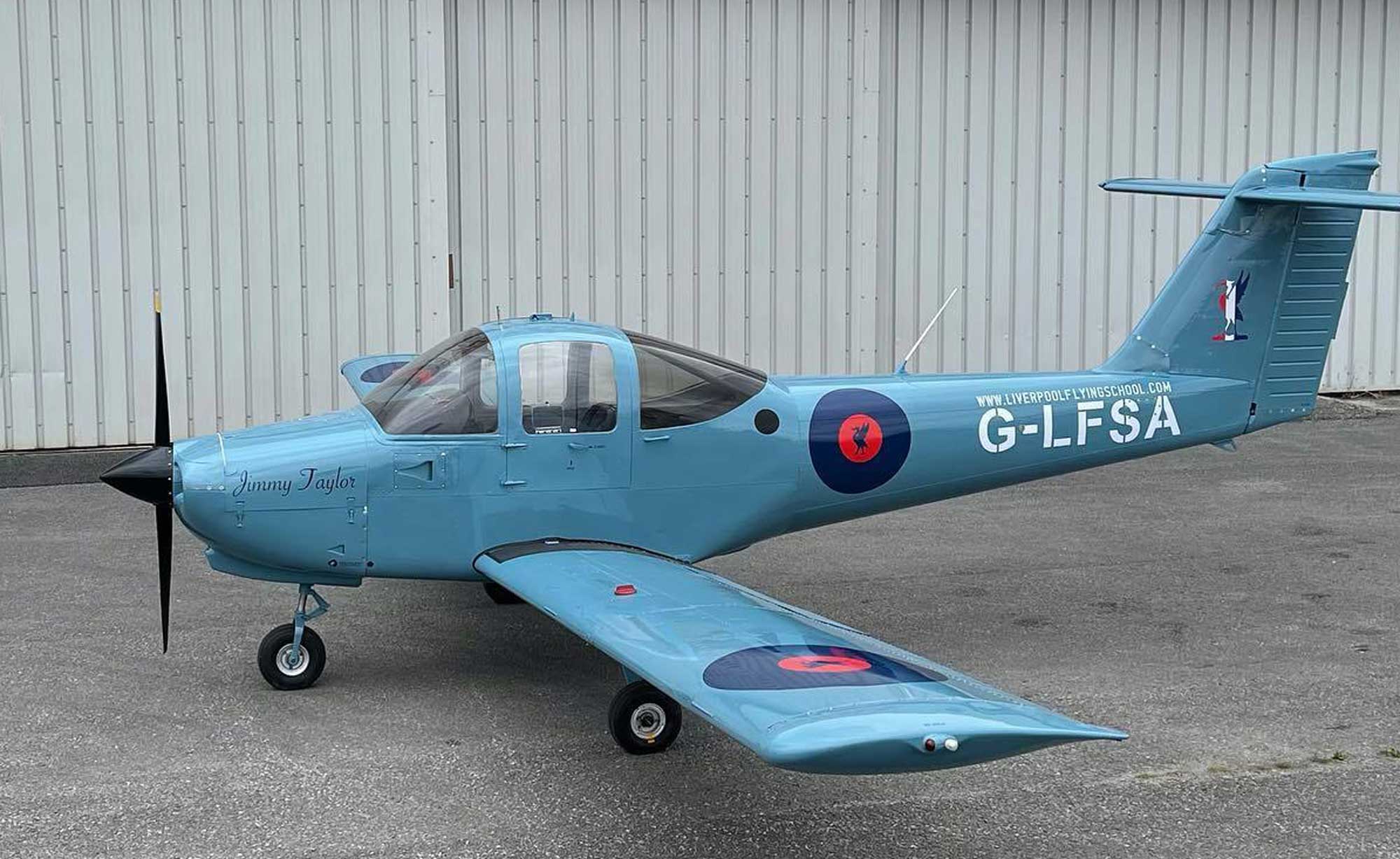 Liverpool goes blue for Jimmy Taylor : : FLYER